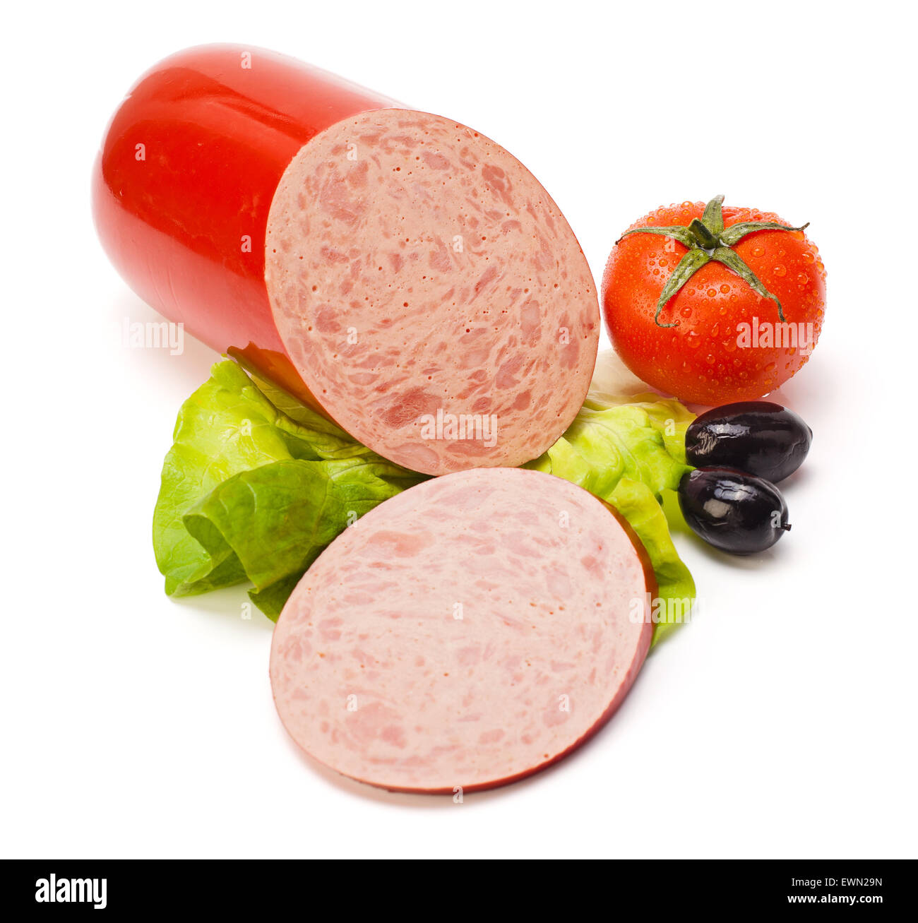 Thick salami in red plastic, slice and olive, tomato decoration Stock ...