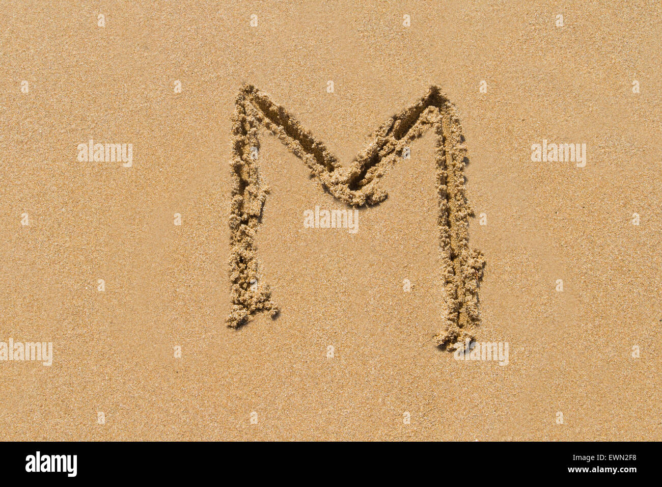 Alphabet Writing On Sand Letter High Resolution Stock Photography and ...