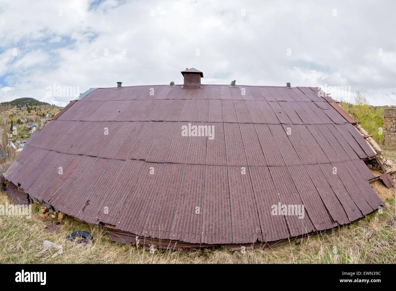 Unique rusted shed roof with rain drops on it Stock Photo - Alamy