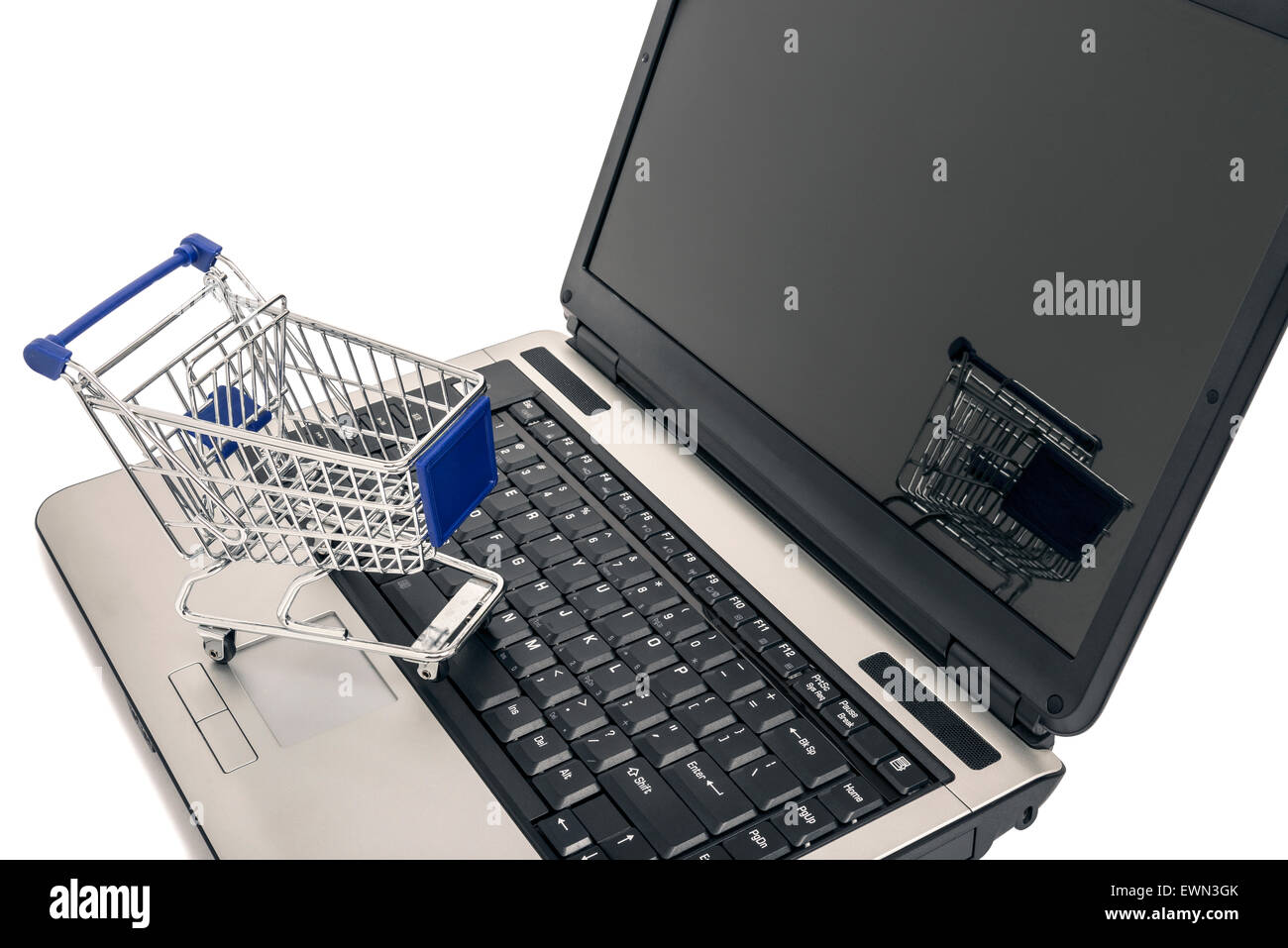 Shopping cart on laptop computer with reflection on monitor screen ...