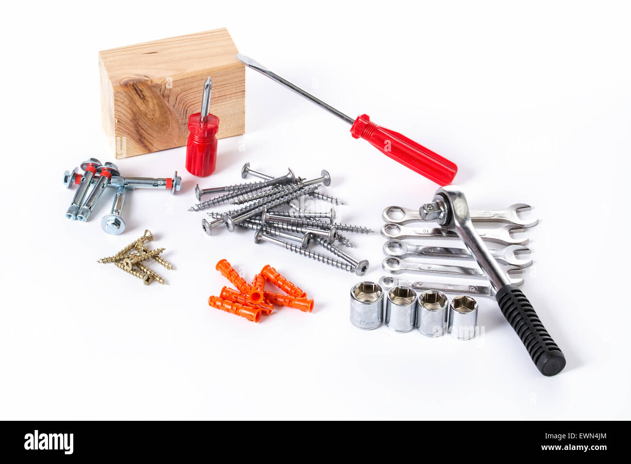 set of screws and working tools over white background Stock Photo - Alamy