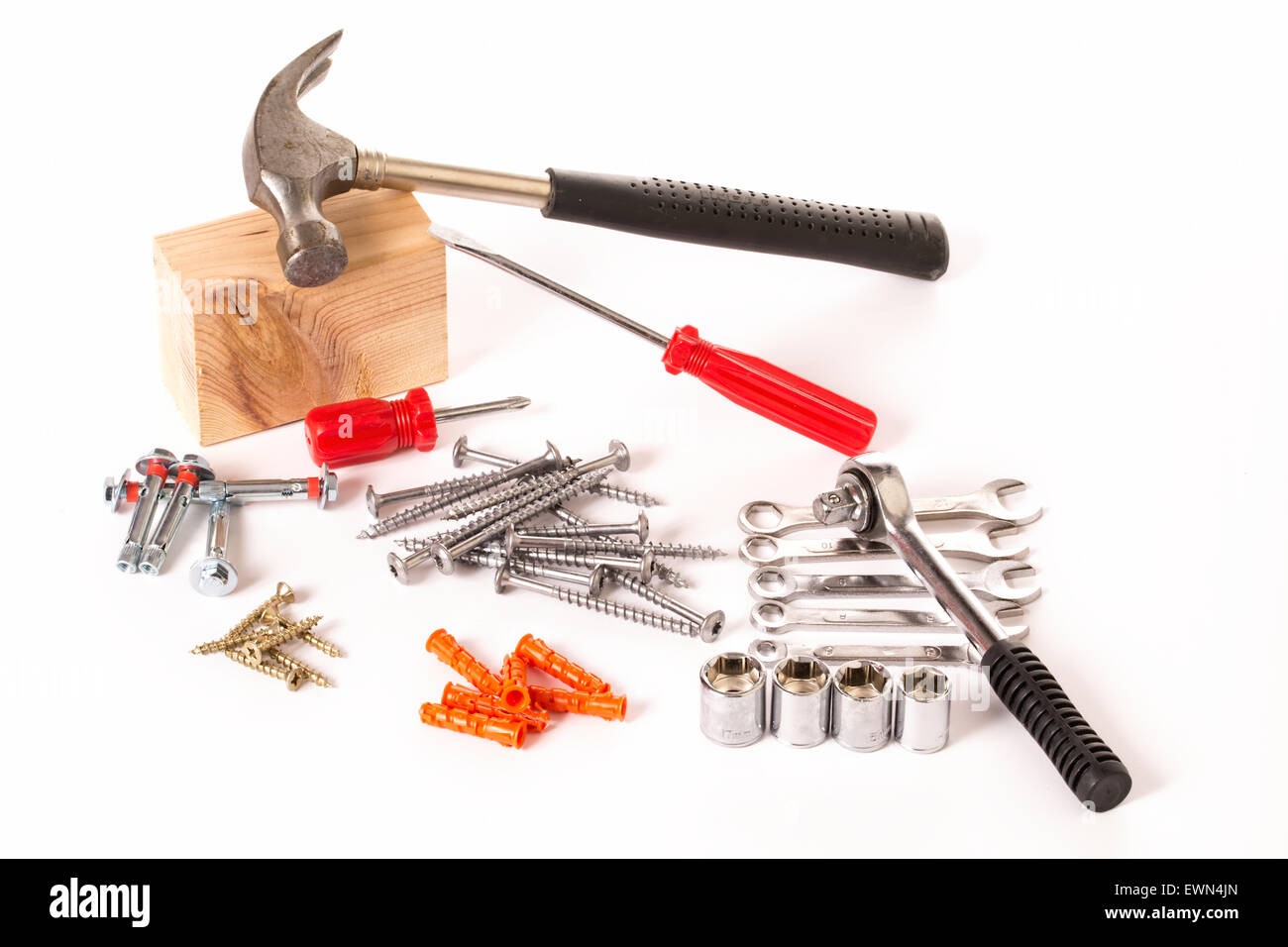 set of screws and working tools over white background Stock Photo - Alamy