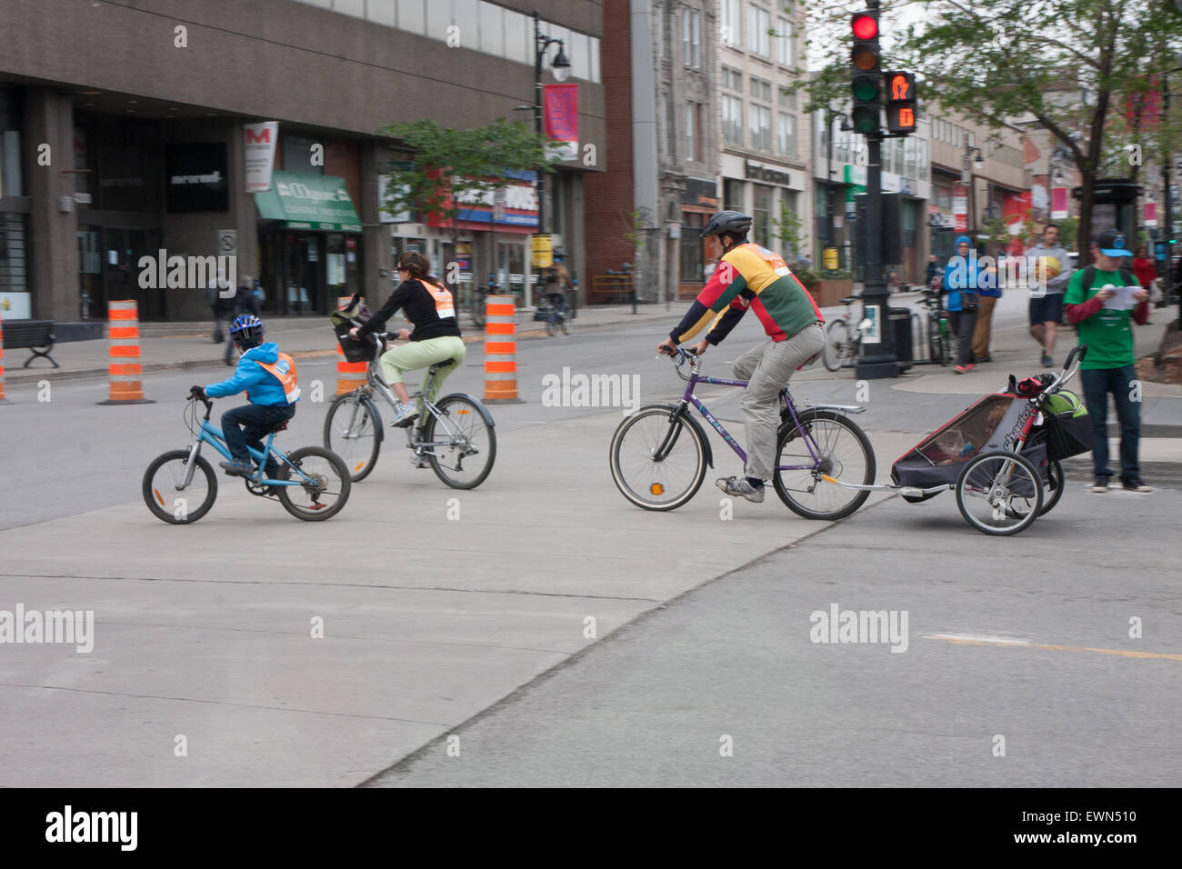 Child riding bicycle busy road hi-res stock photography and images - Alamy