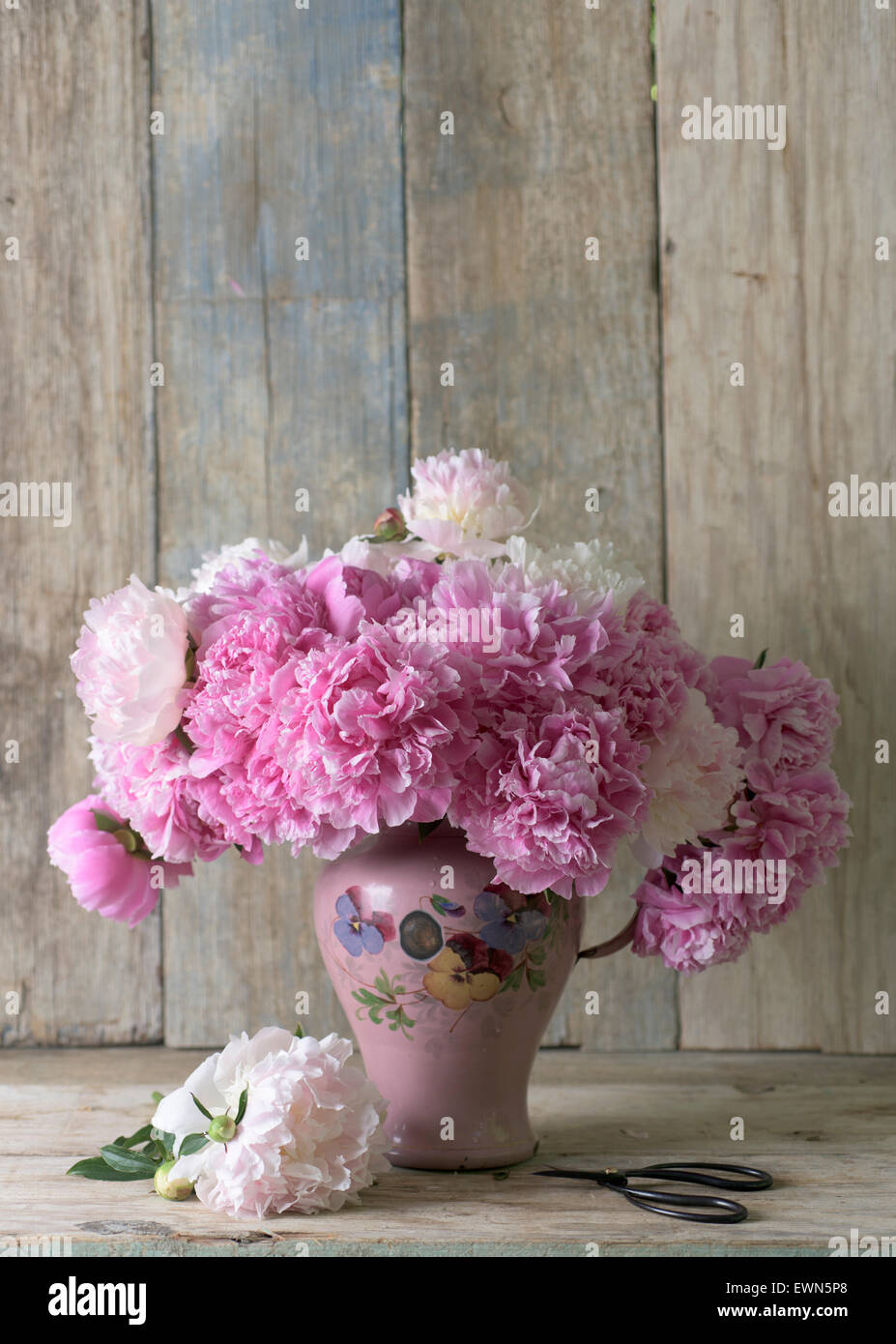 Bouquet of mixed pink and white peonies in container Stock Photo - Alamy