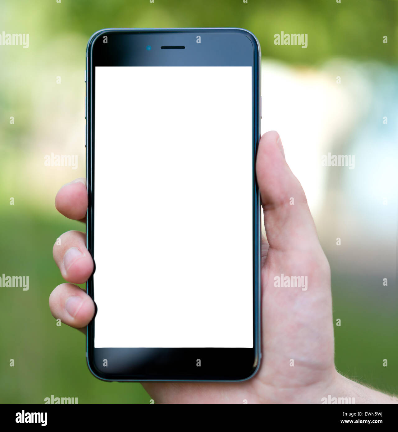 Male hand holding the phone with isolated screen Stock Photo - Alamy
