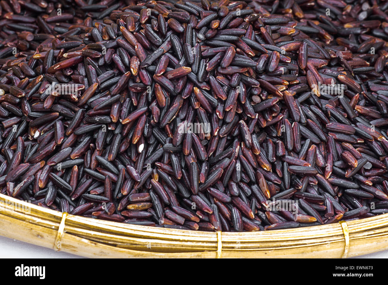 Black Jasmine Rice (Rice Berry) in bamboo basket isolated white Stock ...