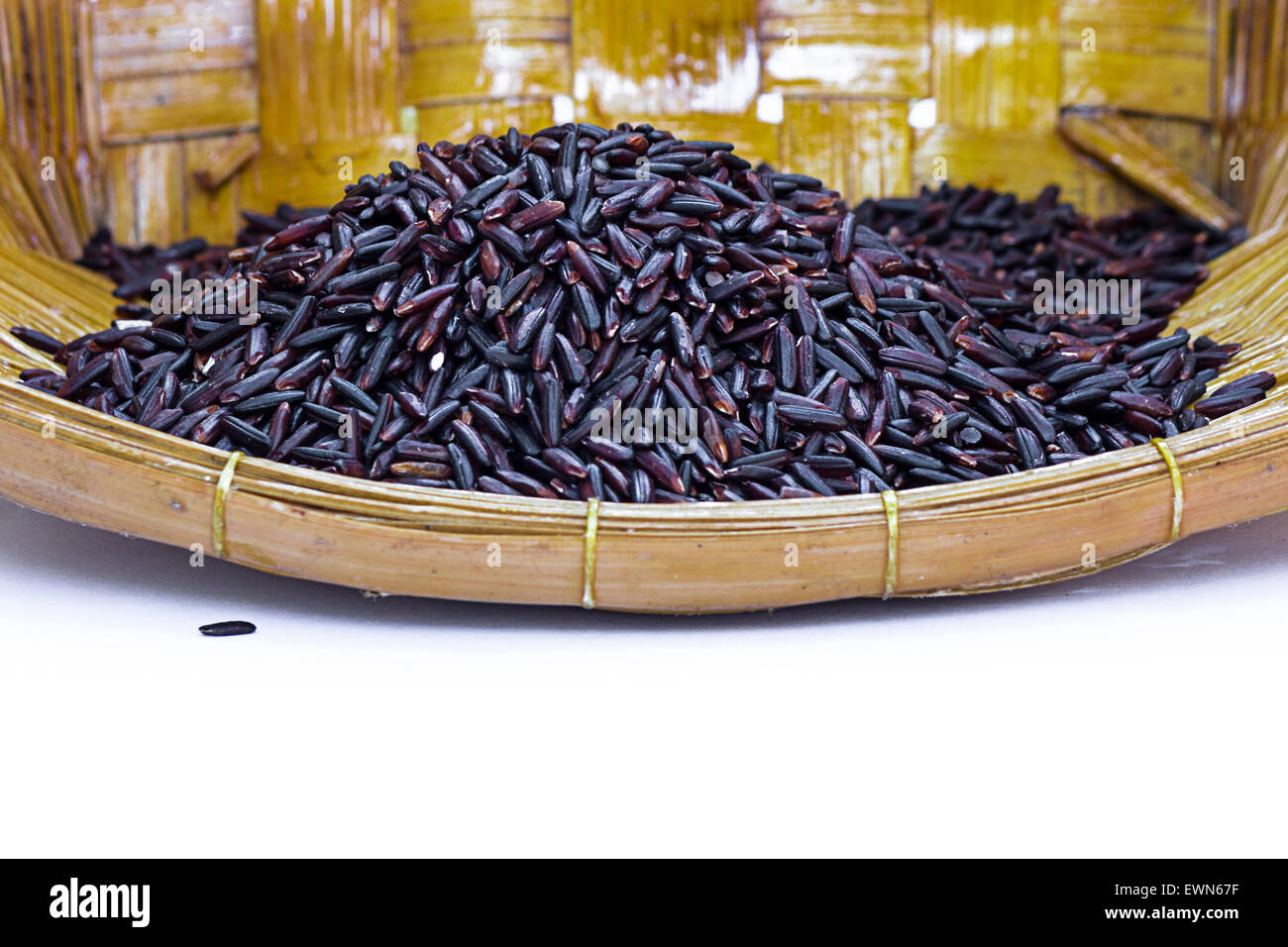 Black Jasmine Rice (Rice Berry) in bamboo basket isolated white Stock ...