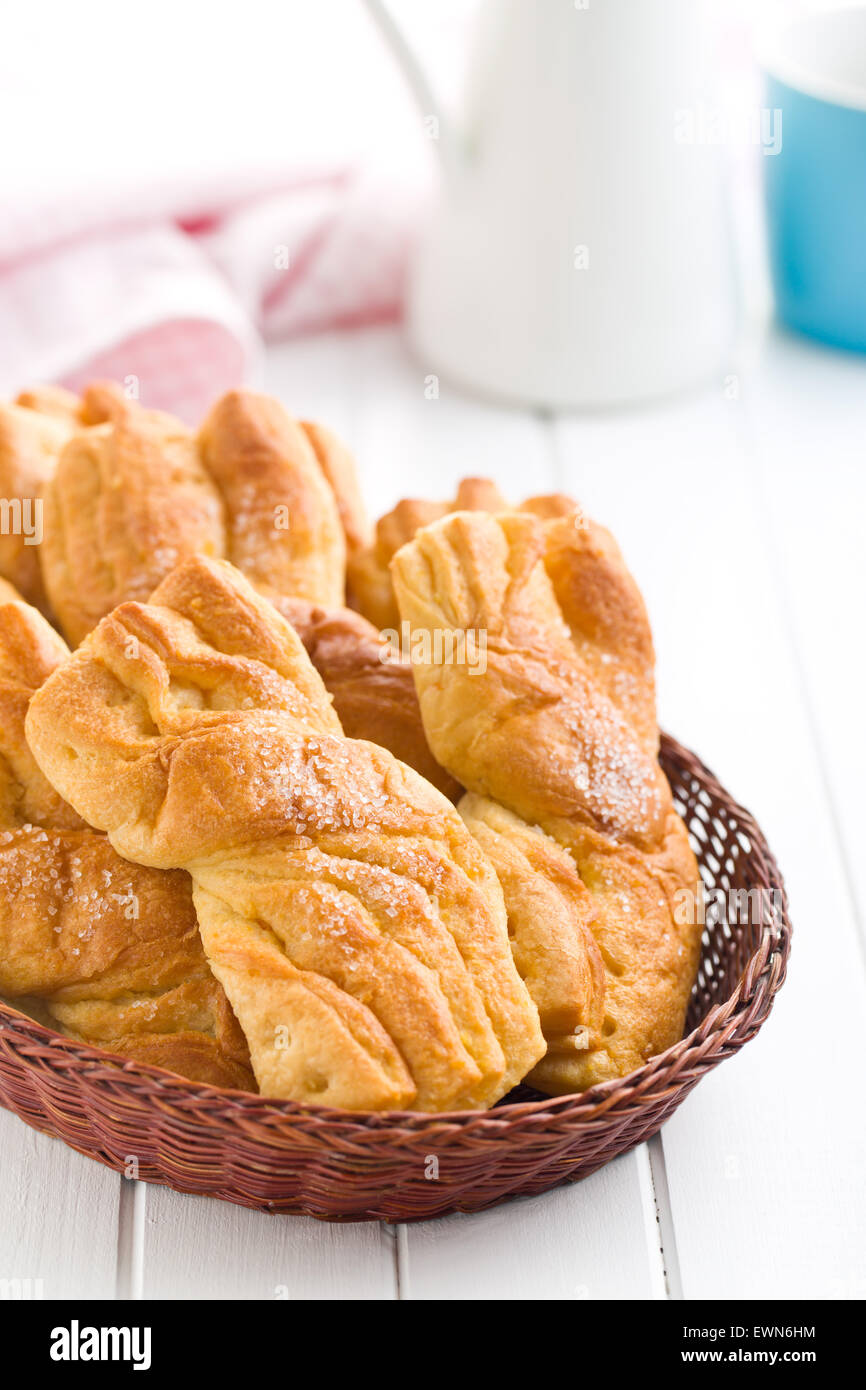 tasty baked bun on kitchen table Stock Photo - Alamy
