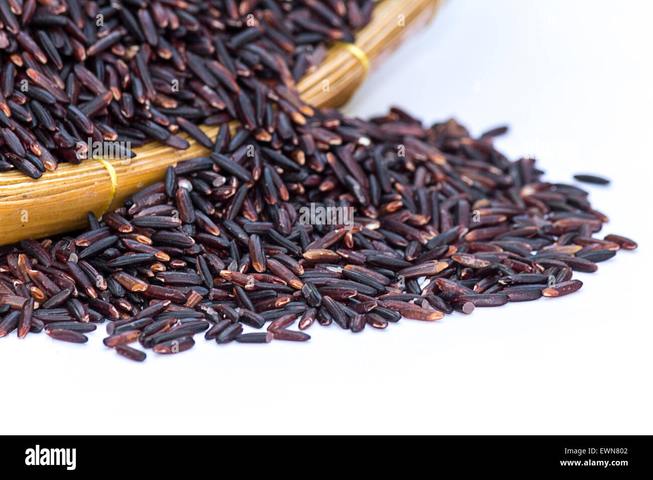 Black Jasmine Rice (Rice Berry) in bamboo basket isolated white Stock ...