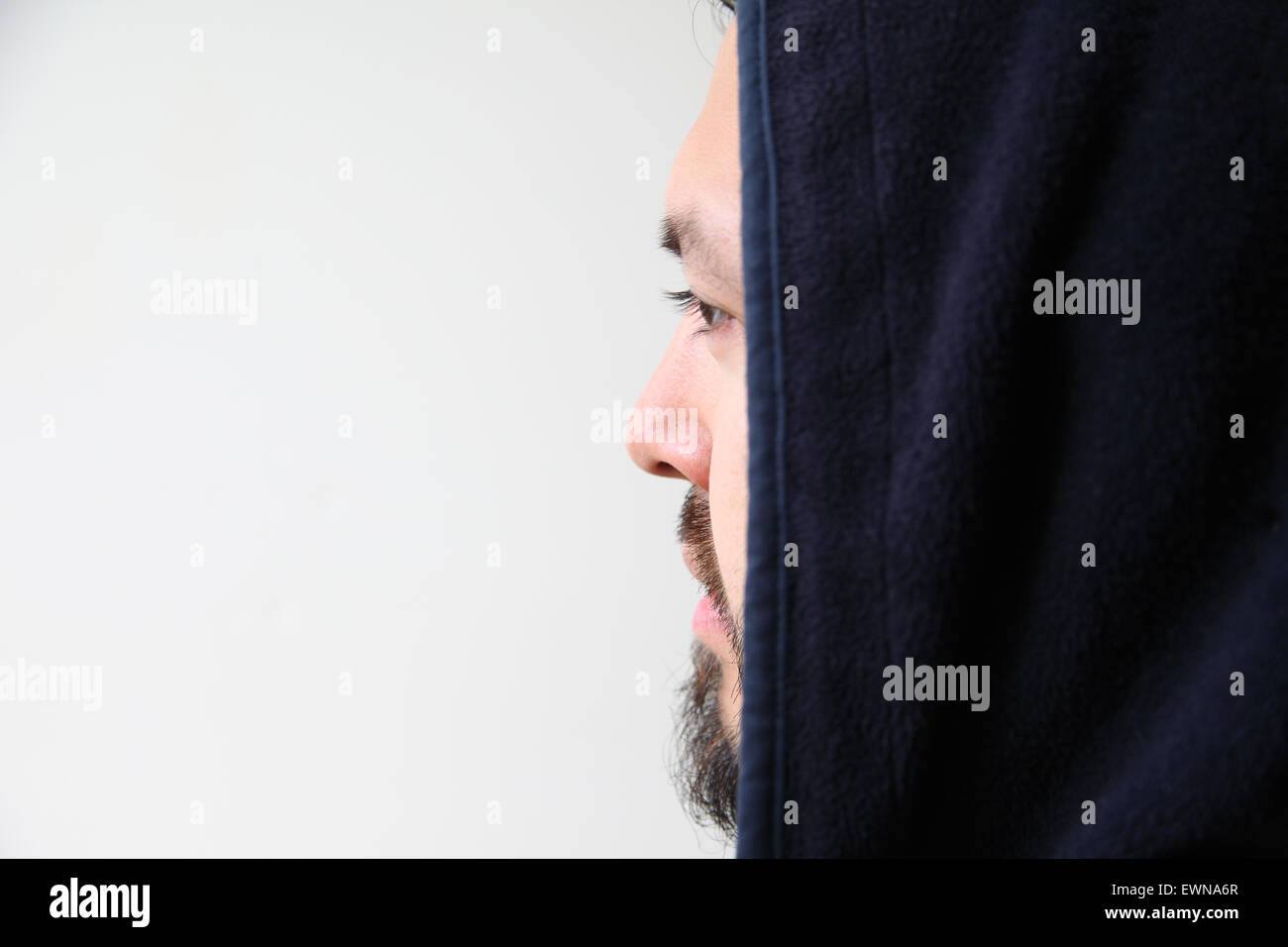 Black hooded hi-res stock photography and images - Alamy
