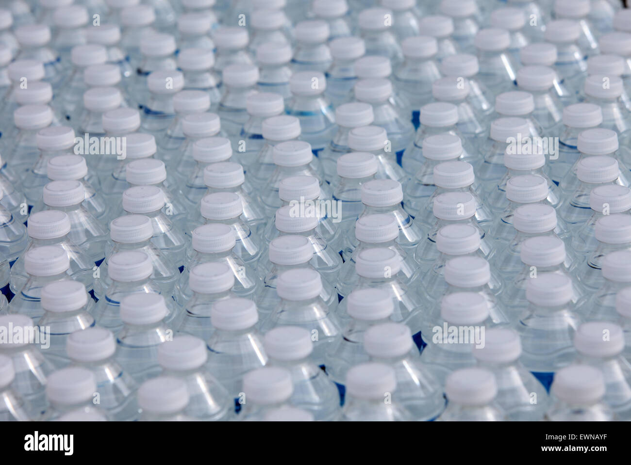 Rows of plastic bottles of drinking water Stock Photo - Alamy