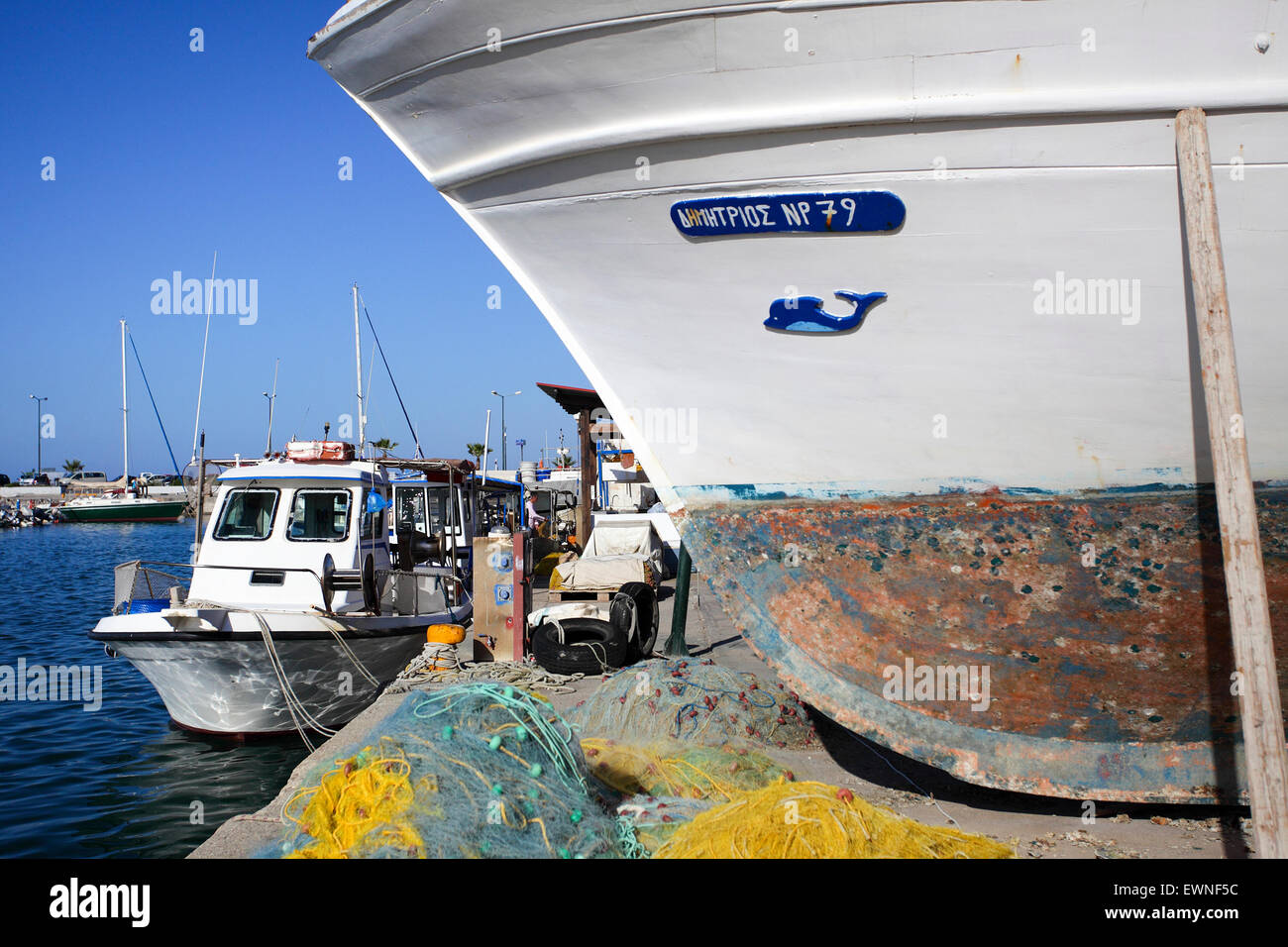 Greek fishing boats under repair hi-res stock photography and images ...