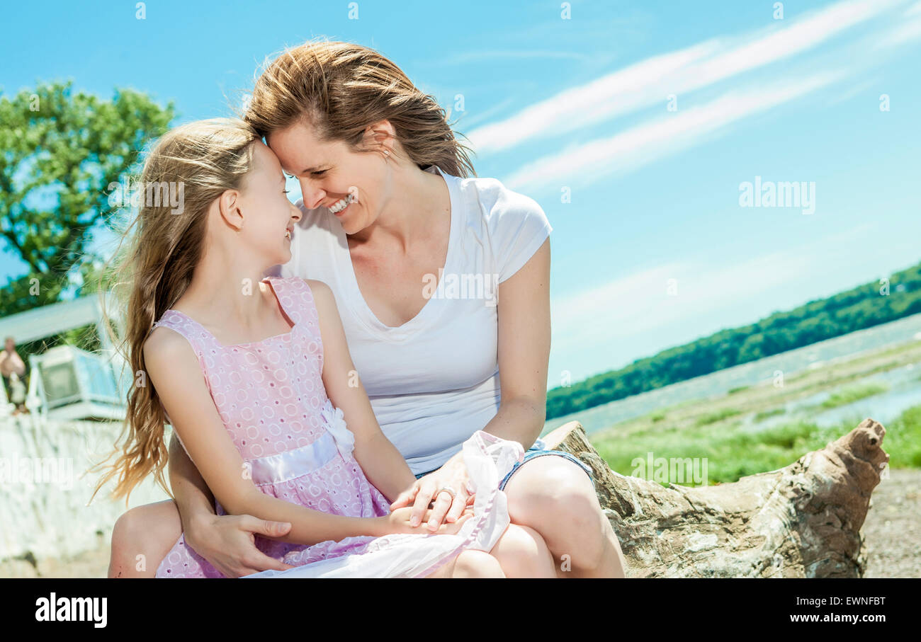 Young mother and her young daughter fun time together outdoors Stock ...