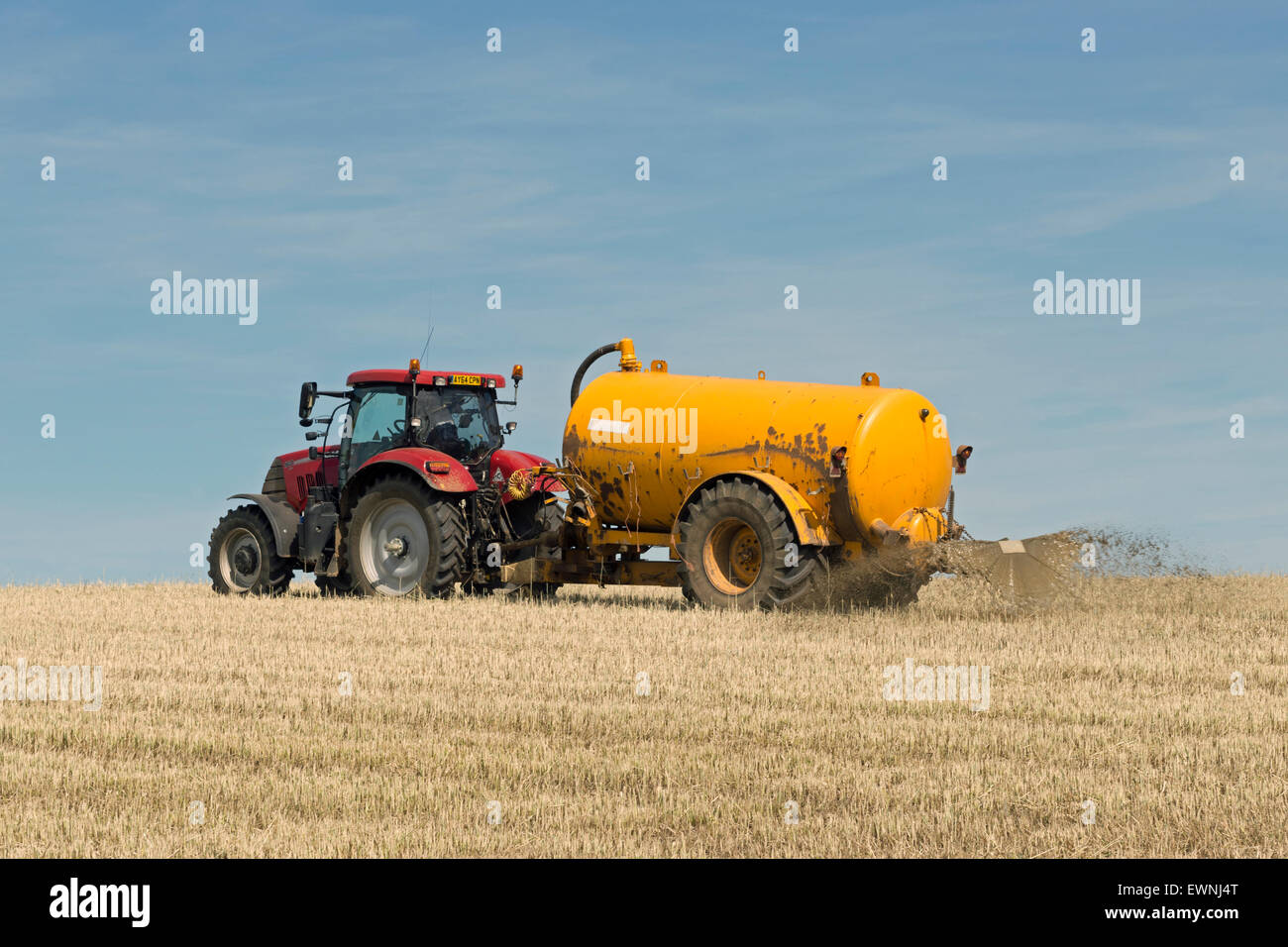 Liquid manure being sprayed onto stubble field, Sutton Heath, Suffolk ...