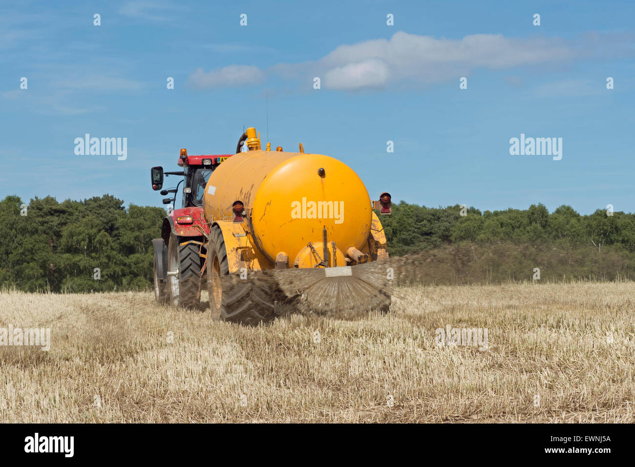 Liquid manure being sprayed onto field, Sutton Heath, Suffolk, UK Stock ...