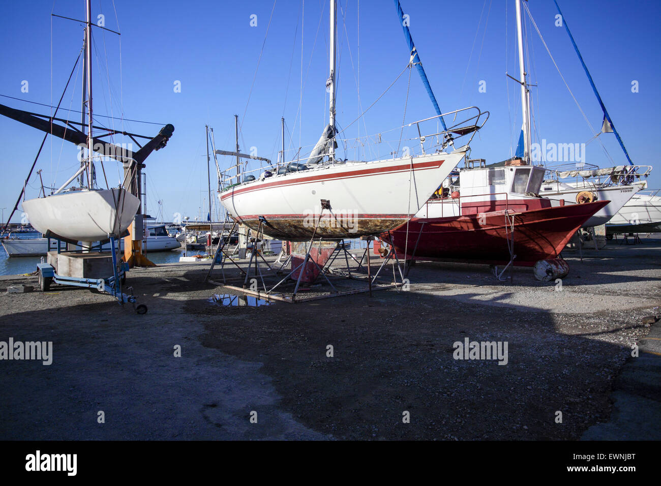 A boat under repair in the boatyard of Rethymnon Marina, viewed here on ...