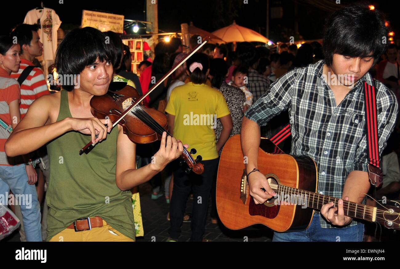 Chiang Mai, Thailand: Two teenage Thai musicians playing a violin and ...