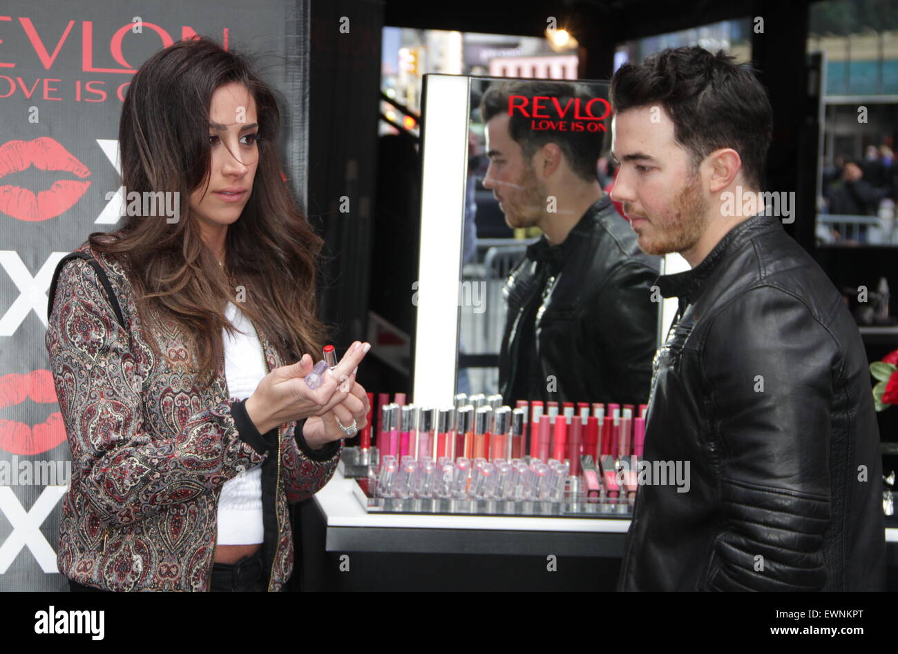 Kevin and Danielle Jonas help kick off National Lover’s Day in New York City by unveiling Revlon ...