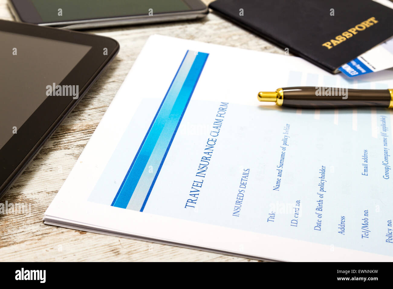 Travel insurance application form with a boarding pass and a passport ...