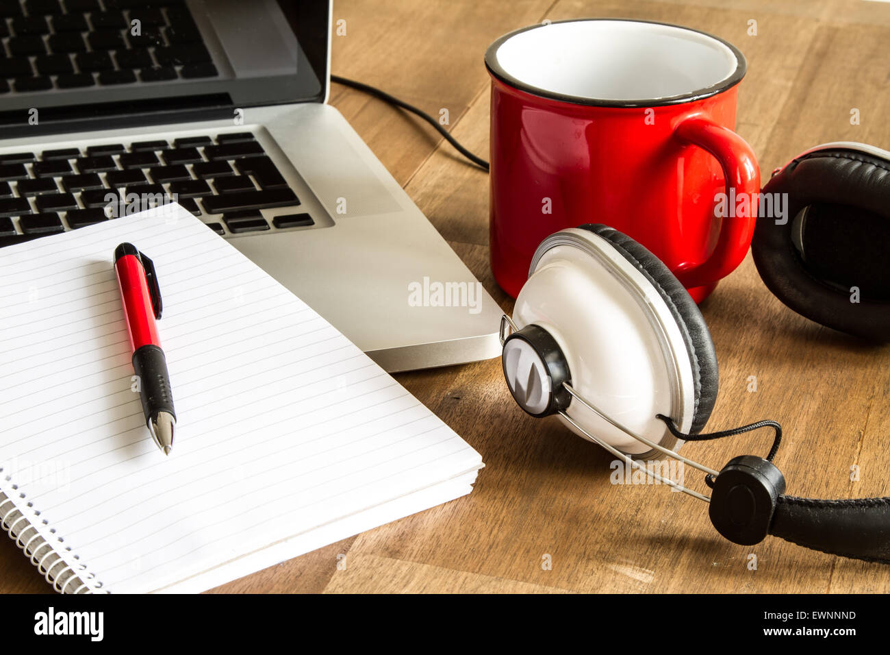 Working with the laptop and taking notes Stock Photo - Alamy