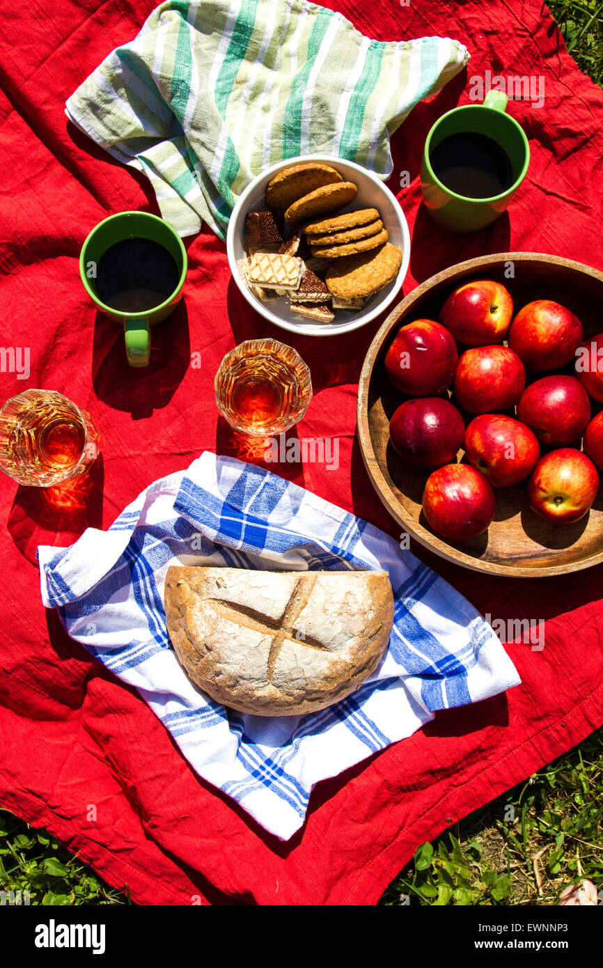 Afternoon snack in the grass Stock Photo - Alamy