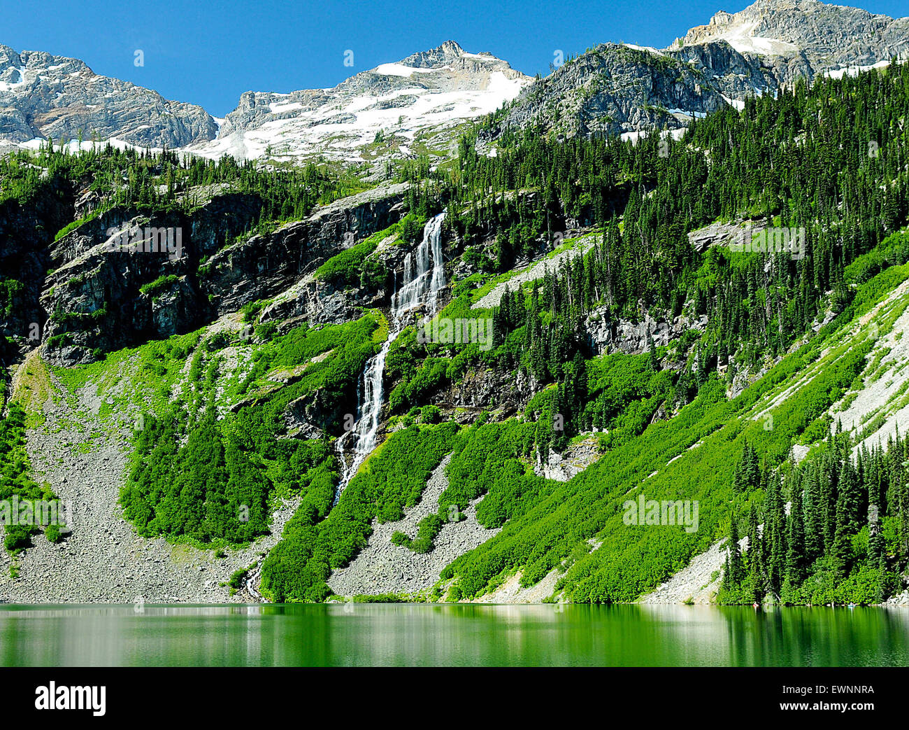 High alpine lake and waterfall in North Cascades National Park ...