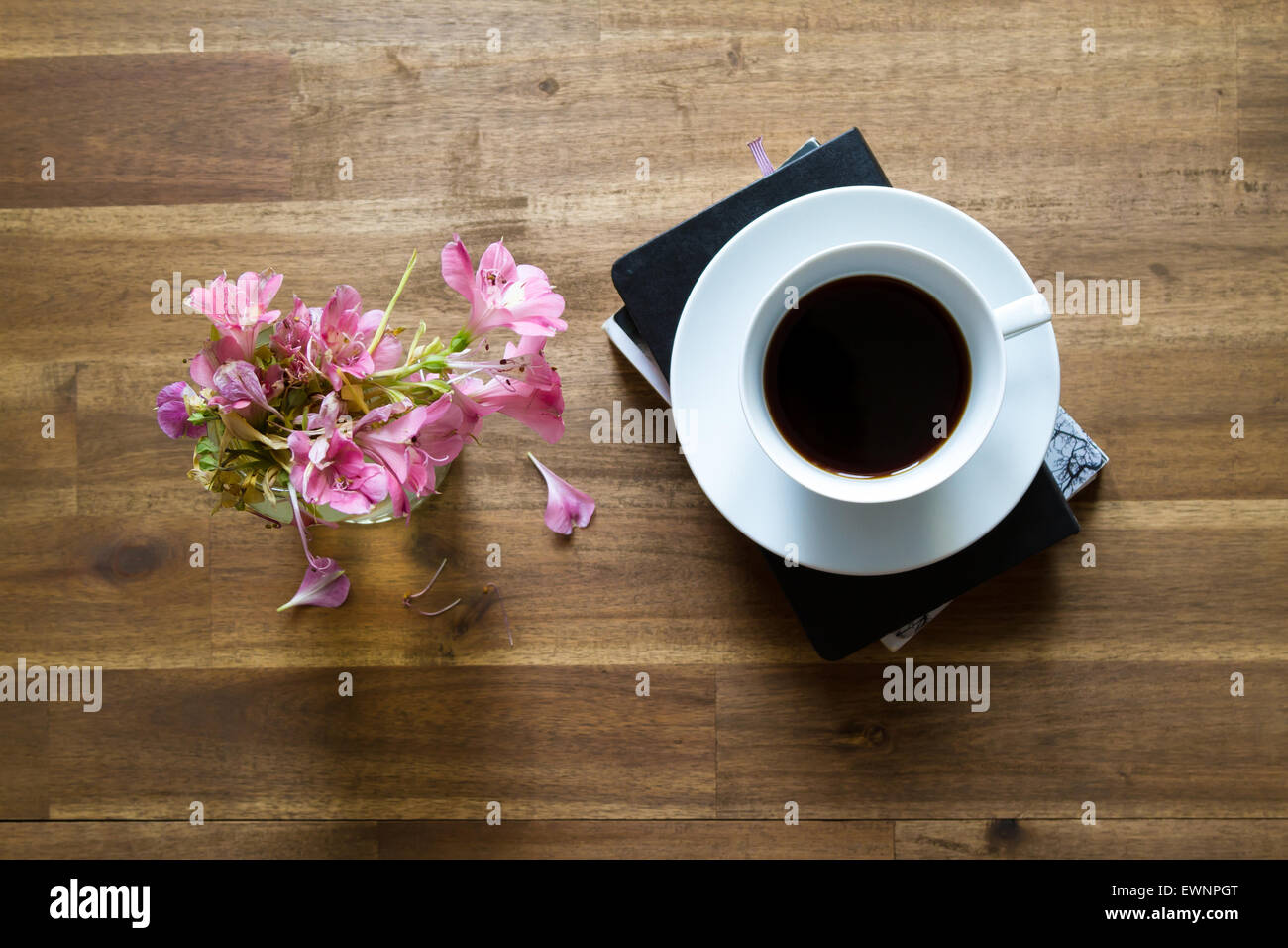 Reading and drinking coffee on a relaxing afternoon Stock Photo - Alamy