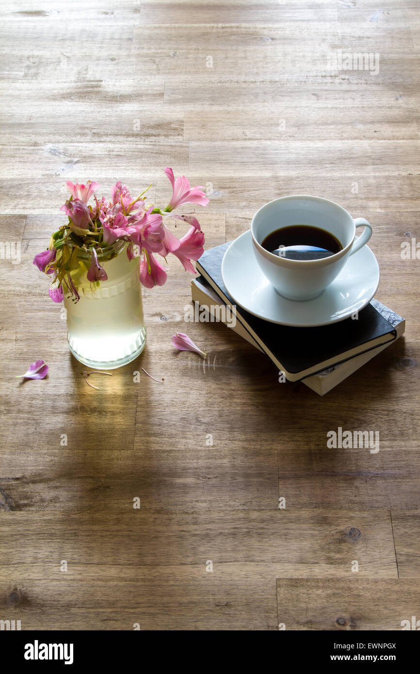 Reading and drinking coffee on a relaxing afternoon Stock Photo - Alamy