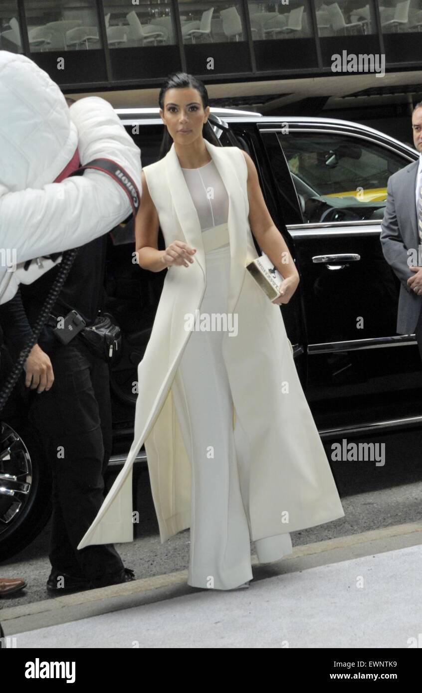 Kim Kardashian wears a dramatic white outfit to Variety's Power of ...