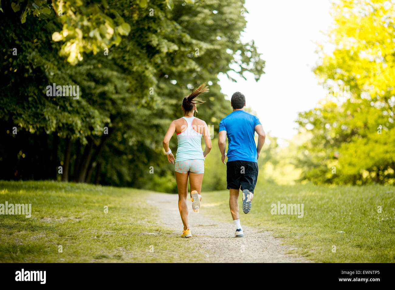 Young sportive man woman hi-res stock photography and images - Alamy