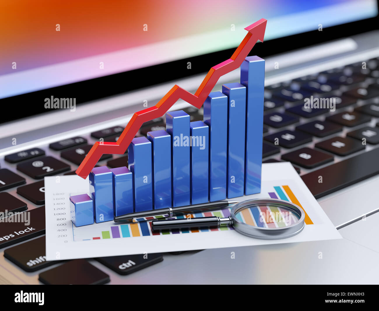Magnifying glass and the working paper with a diagram hi-res stock ...