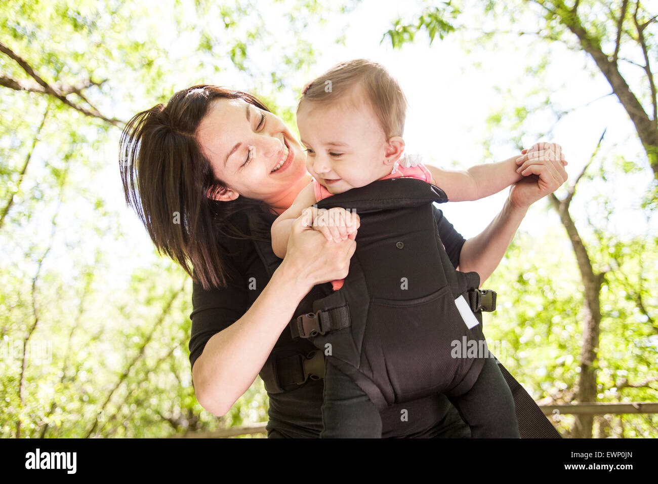 Mother and daughter in forest Stock Photo - Alamy