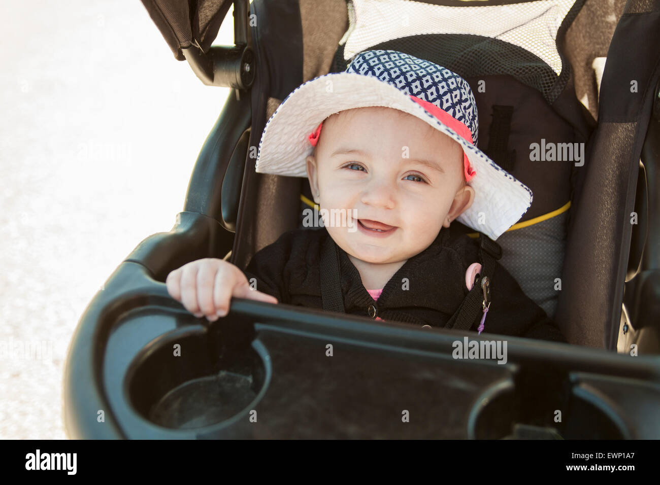 Baby sitting stroller Stock Photo - Alamy