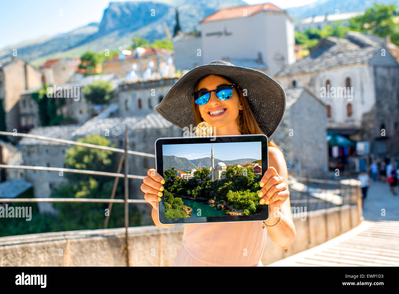 Woman promoting tourism in Mostar city Stock Photo - Alamy