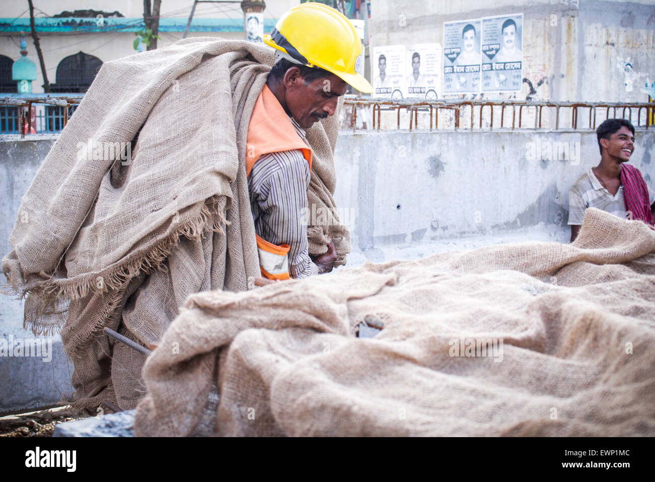 Dhaka, Bangladesh. 29th June, 2015. A construction worker working at ...