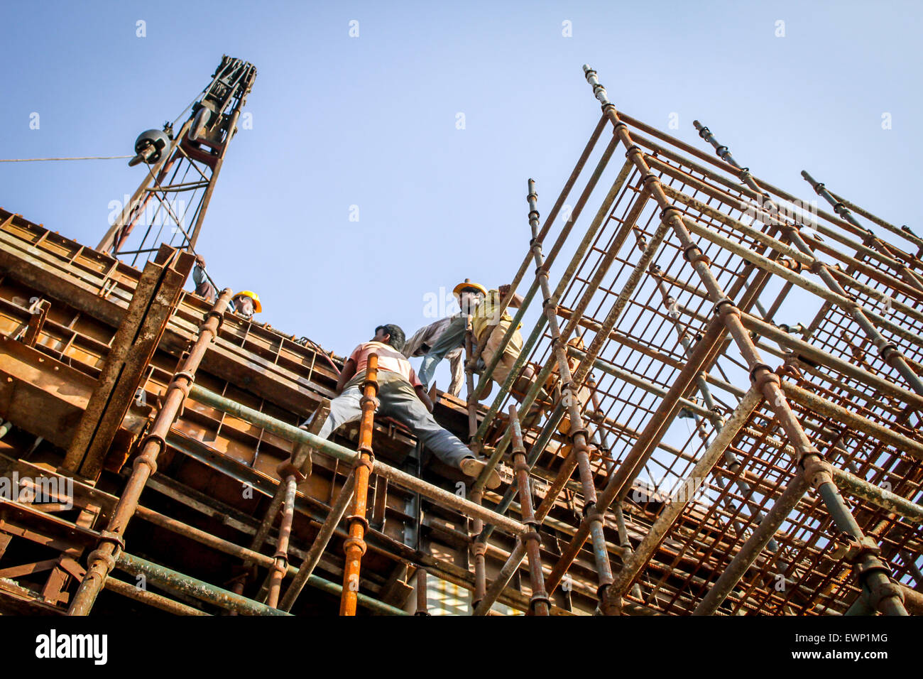 Dhaka, Bangladesh. 29th June, 2015. A construction worker working at ...