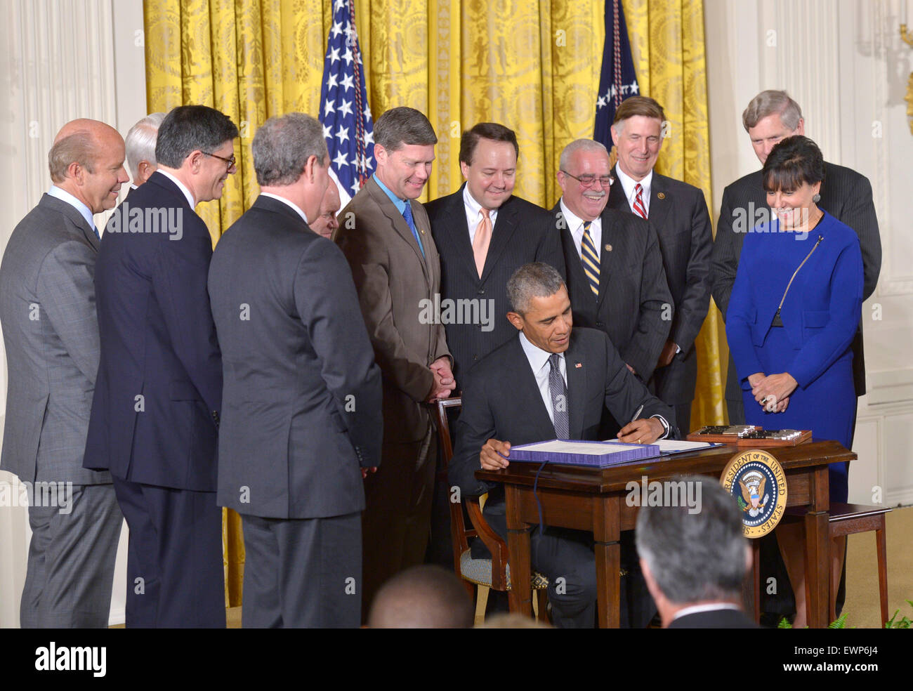 Washington, DC, USA. 29th June, 2015. U.S. President Barack Obama signs ...