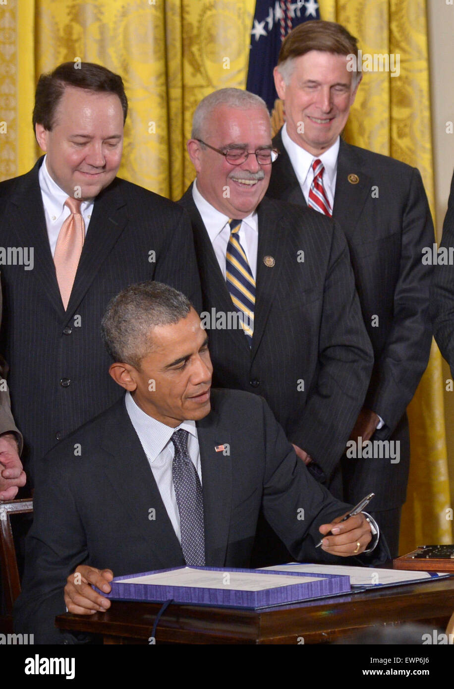 Washington, DC, USA. 29th June, 2015. U.S. President Barack Obama signs ...