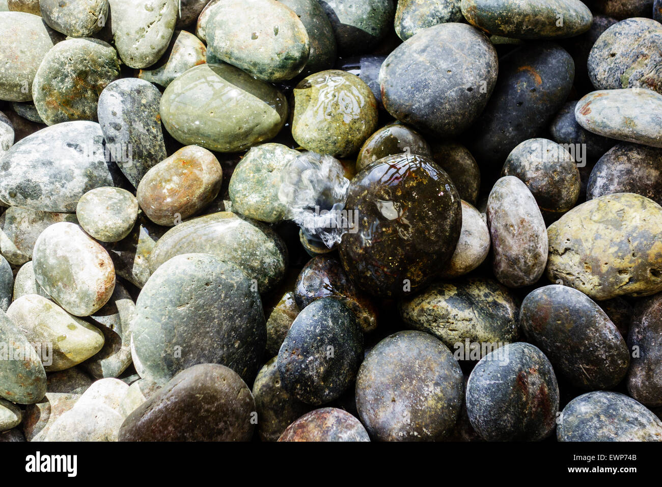 Water bubbling up flowing over hi-res stock photography and images - Alamy