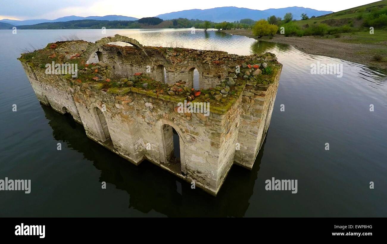 These images show the submerged Church of St. Ivan Rilski in Zhrebchevo ...