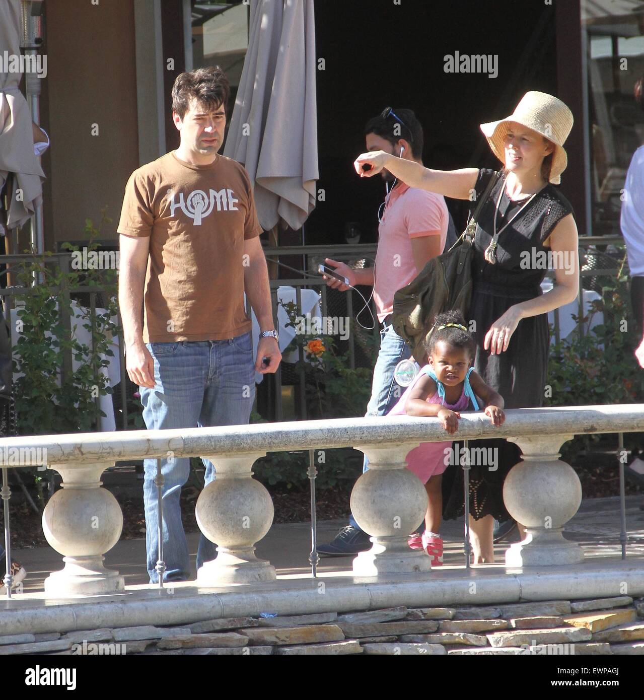 Ron Livingston takes his film actress wife Rosemarie DeWitt and their ...