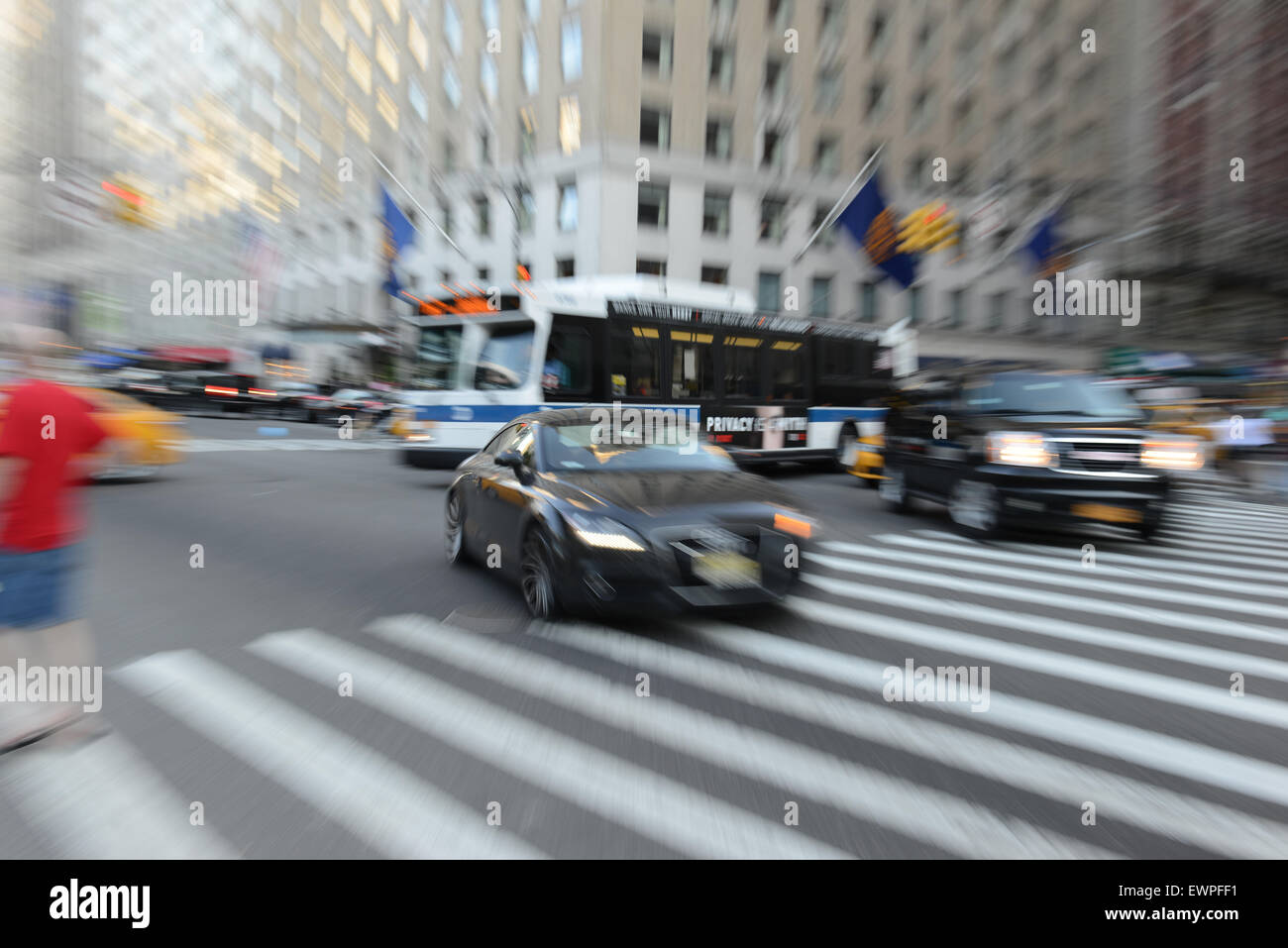 Purposely Blurred taxi cabs and vehicles in traffic showing fast motion ...