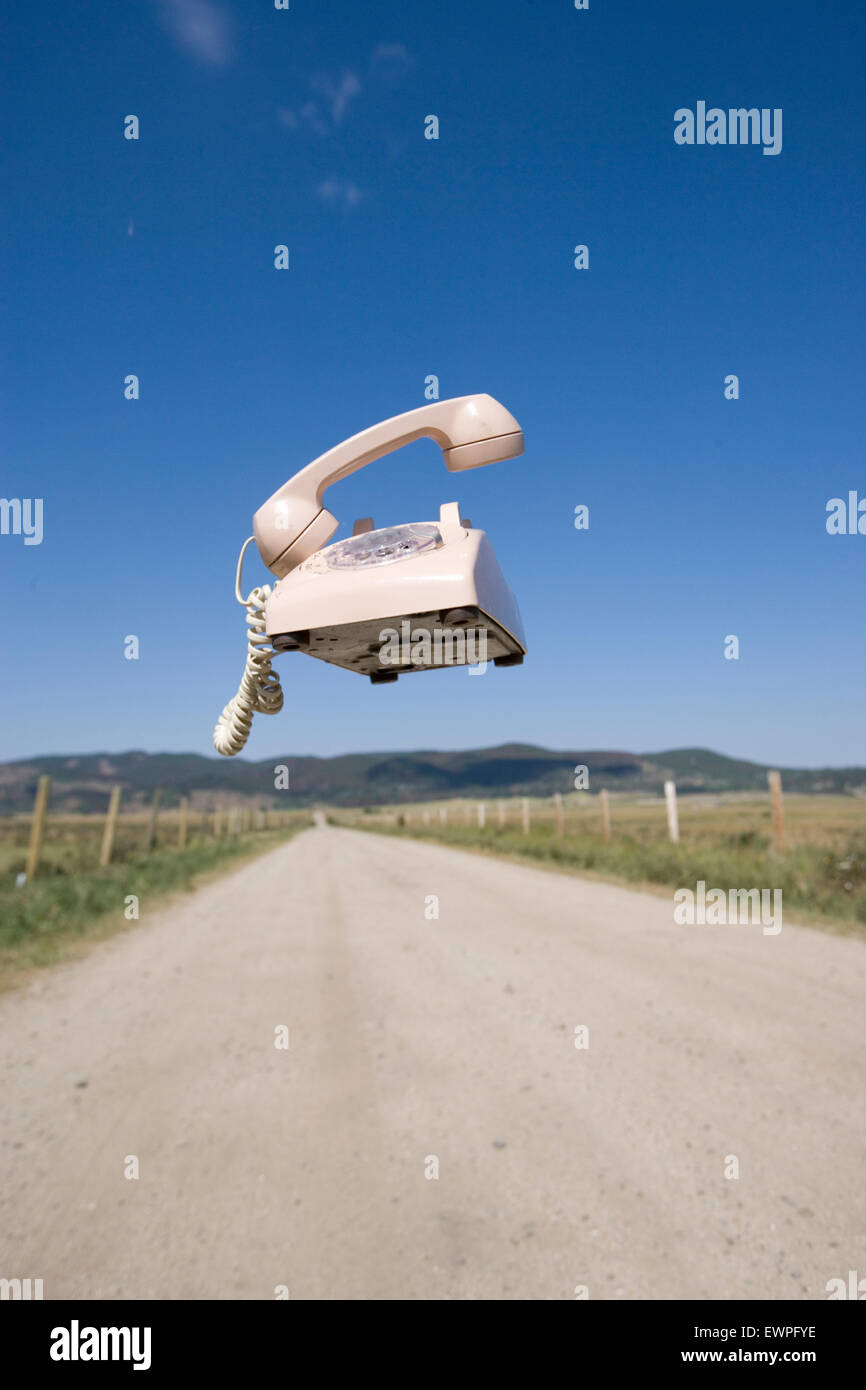 A telephone floating in air above a remote dirt road in Elk Park ...