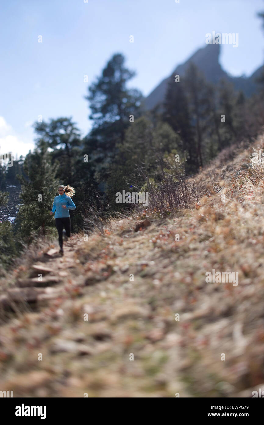 Woman running toward camera hi-res stock photography and images - Alamy