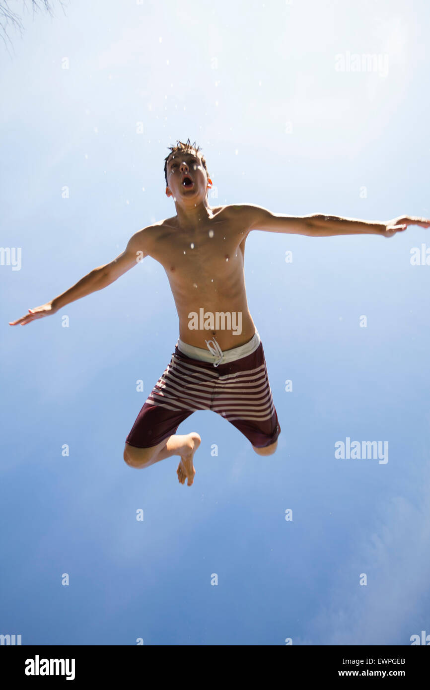A flying teenage boy! Stock Photo - Alamy