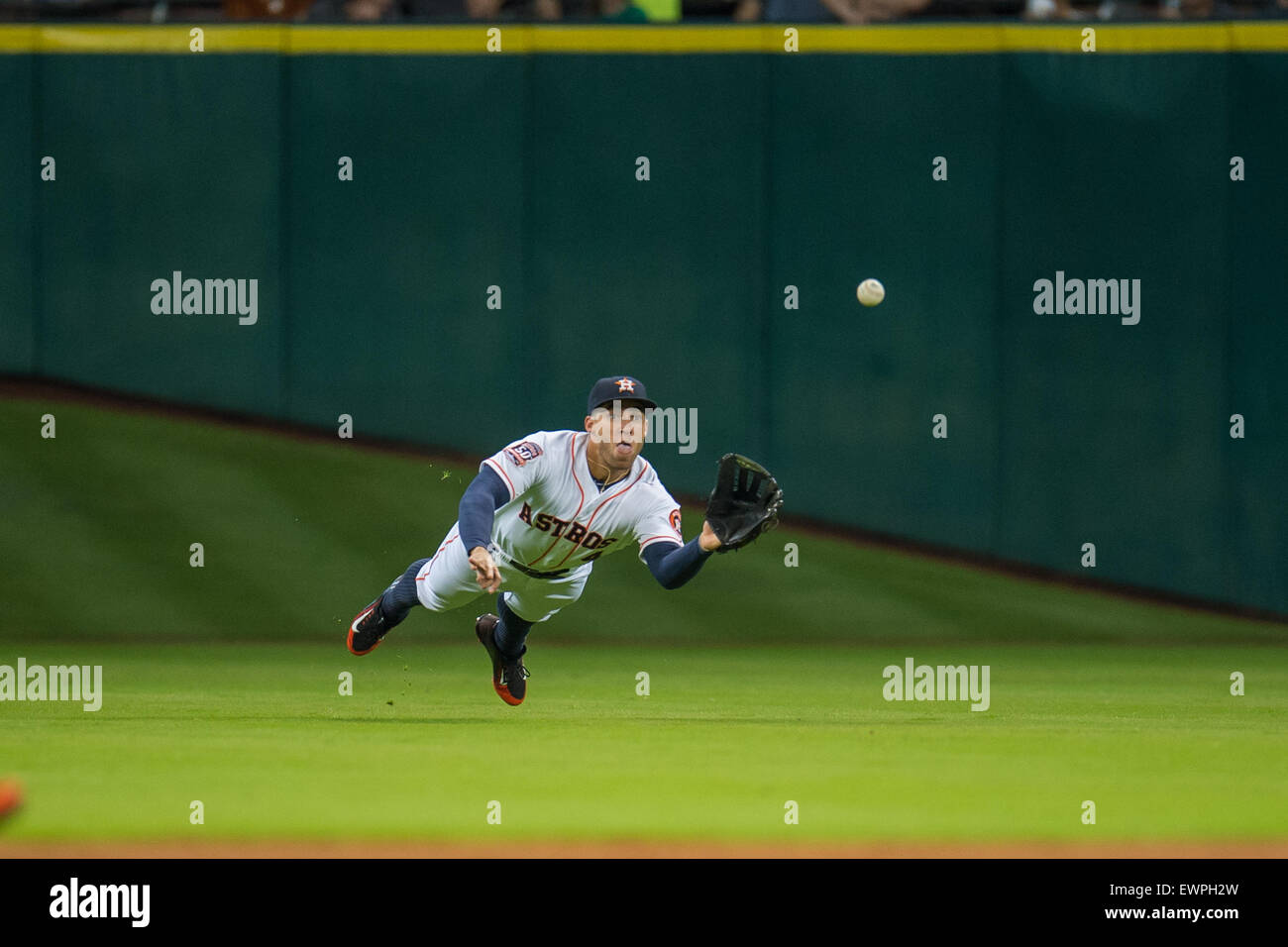 Fielder diving to catch ball hi-res stock photography and images - Alamy