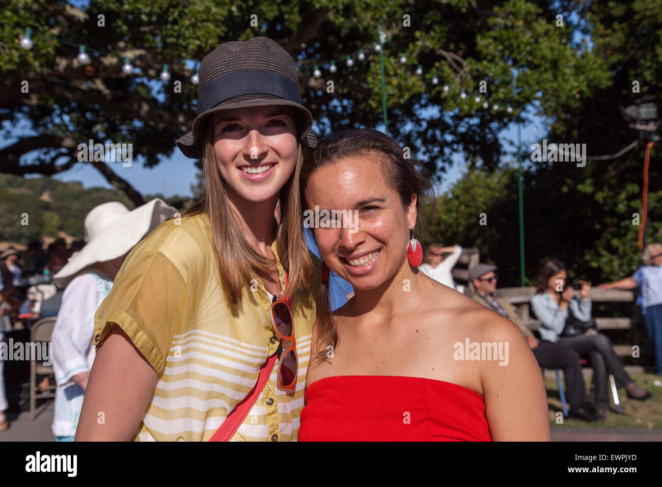 Two female friends enjoying the festival, Novato, California, USA Stock ...