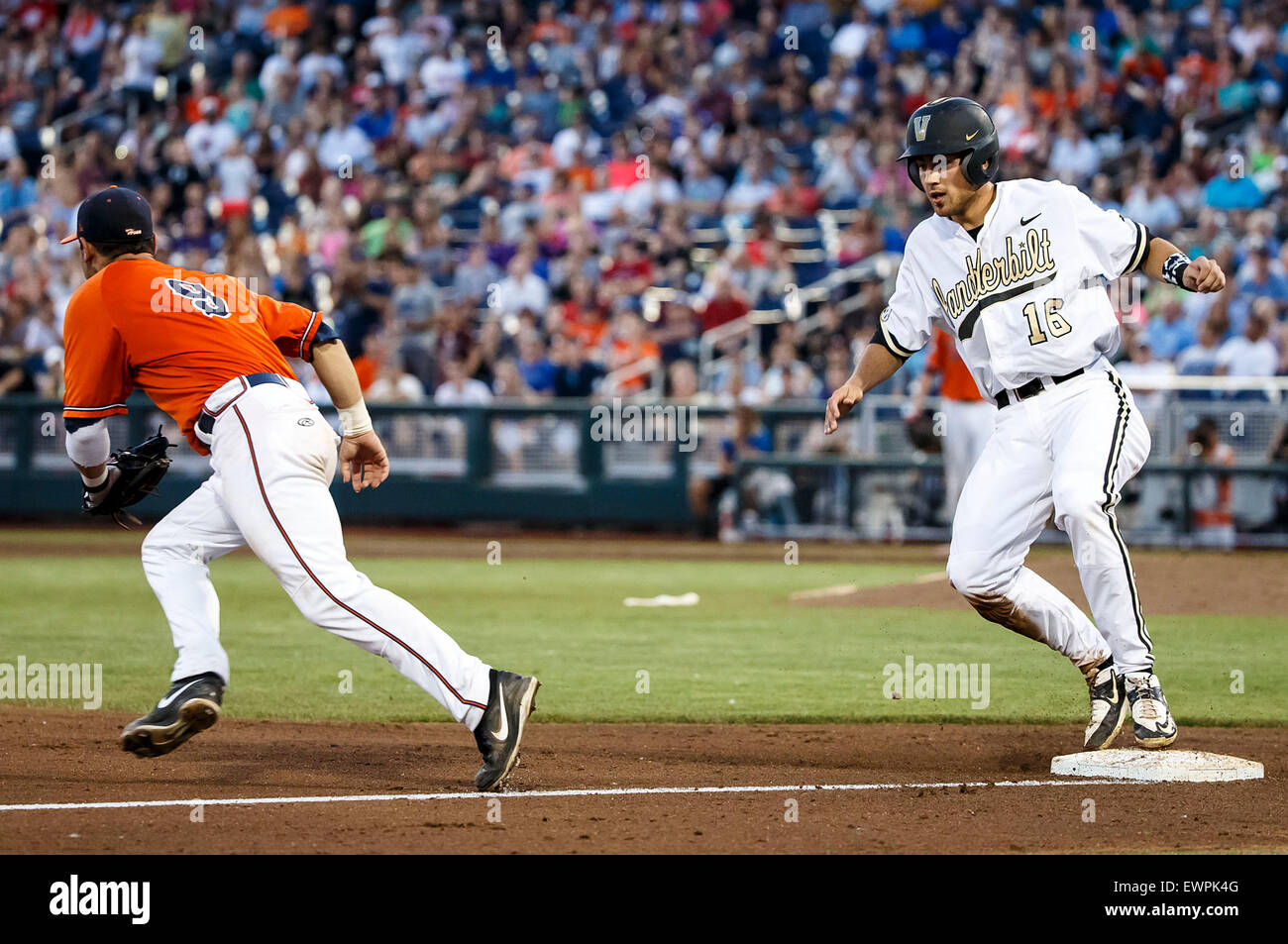 June 24, 2015: Vanderbilt infielder Penn Murfee #16 slides safely into ...