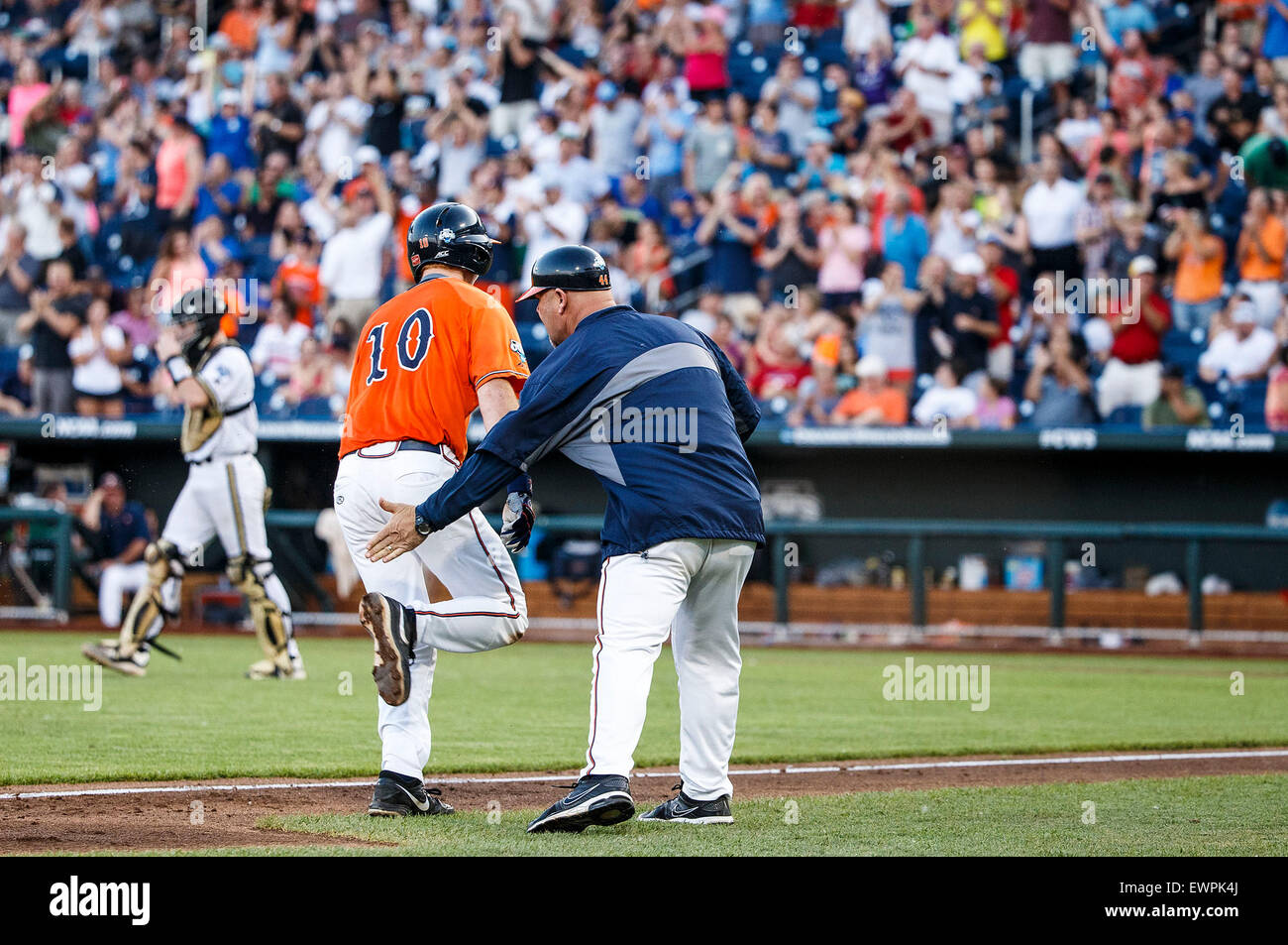 June 24, 2015: Virginia's Pavin Smith #10 touches 3rd base after ...