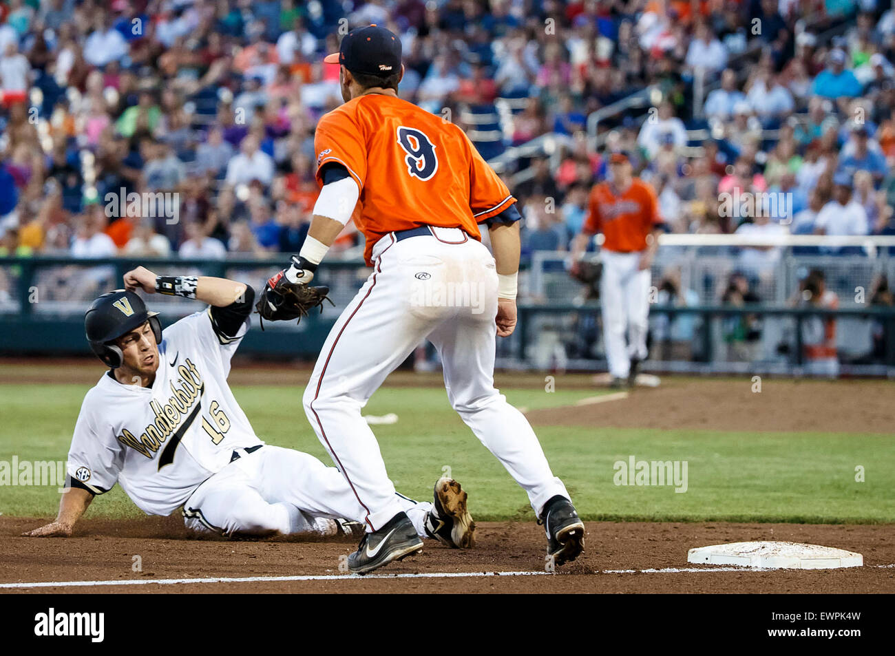 June 24, 2015: Vanderbilt infielder Penn Murfee #16 slides safely into ...